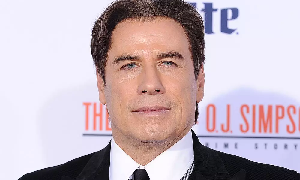 John Travolta waxaa lagu eedeeyay 21 jir nin Masseur ah