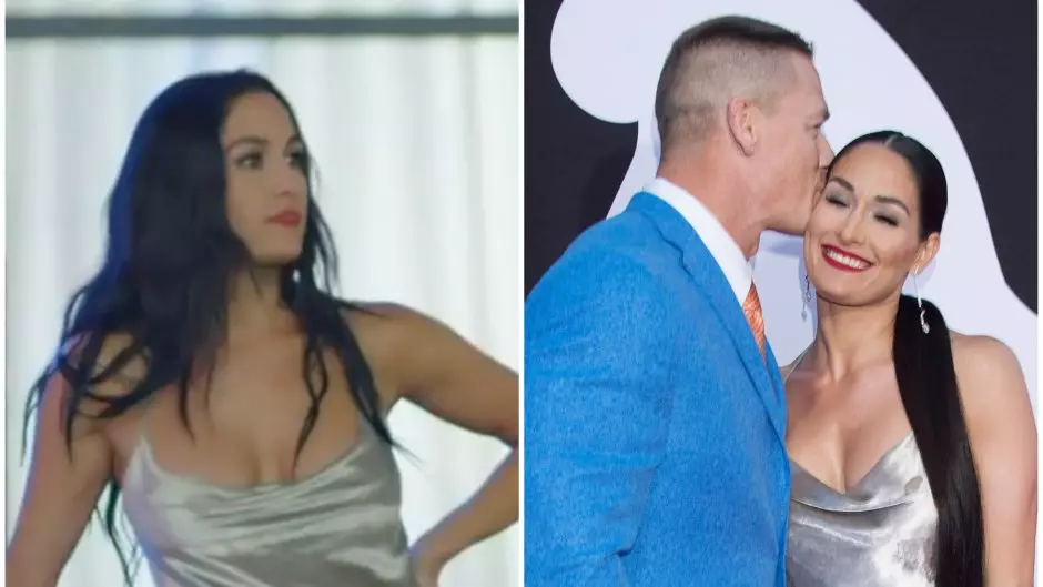 Nikki Bella 身着银色圆领连衣裙与 Artem Chigvintsev 在 Total Bellas 和与 John Cena 约会