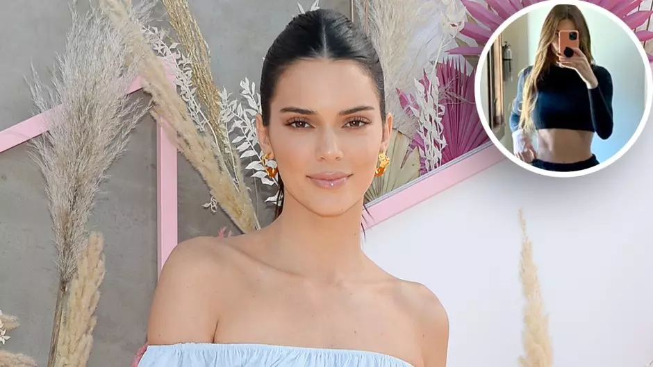 Kendall Jenner skryter av magen sin mens hun er på ferie med familien