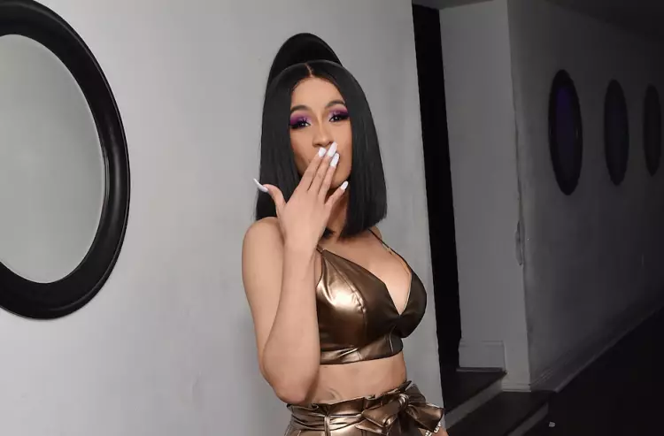 Cardi B, Gold Jumpsuit, Kissy Face, White Nails