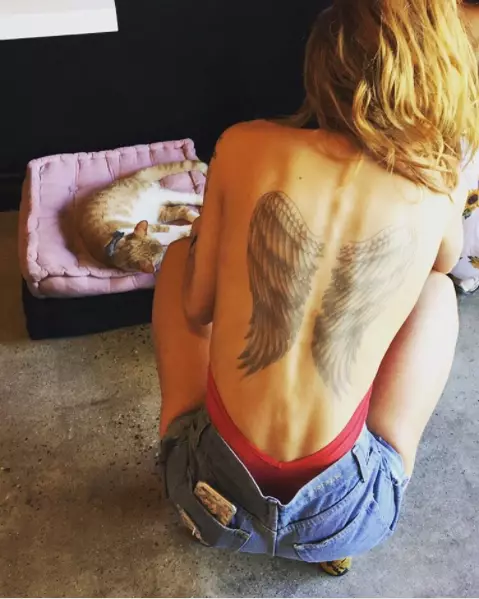 Bella thorne back tattoo