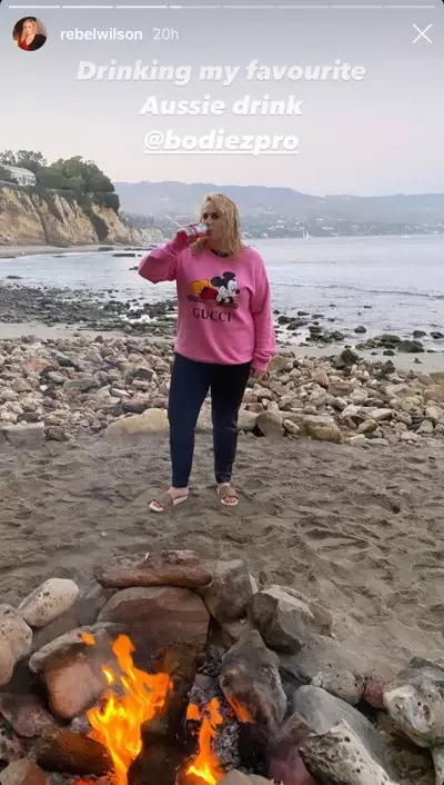 rebel-wilson-looks-fit-at-beach-bonfire